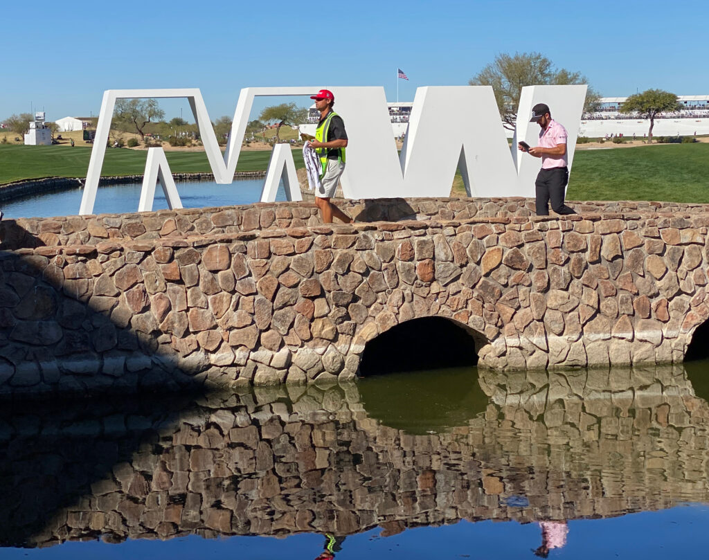 Waste Management | Golfers cross bridge to 16 - Golftime